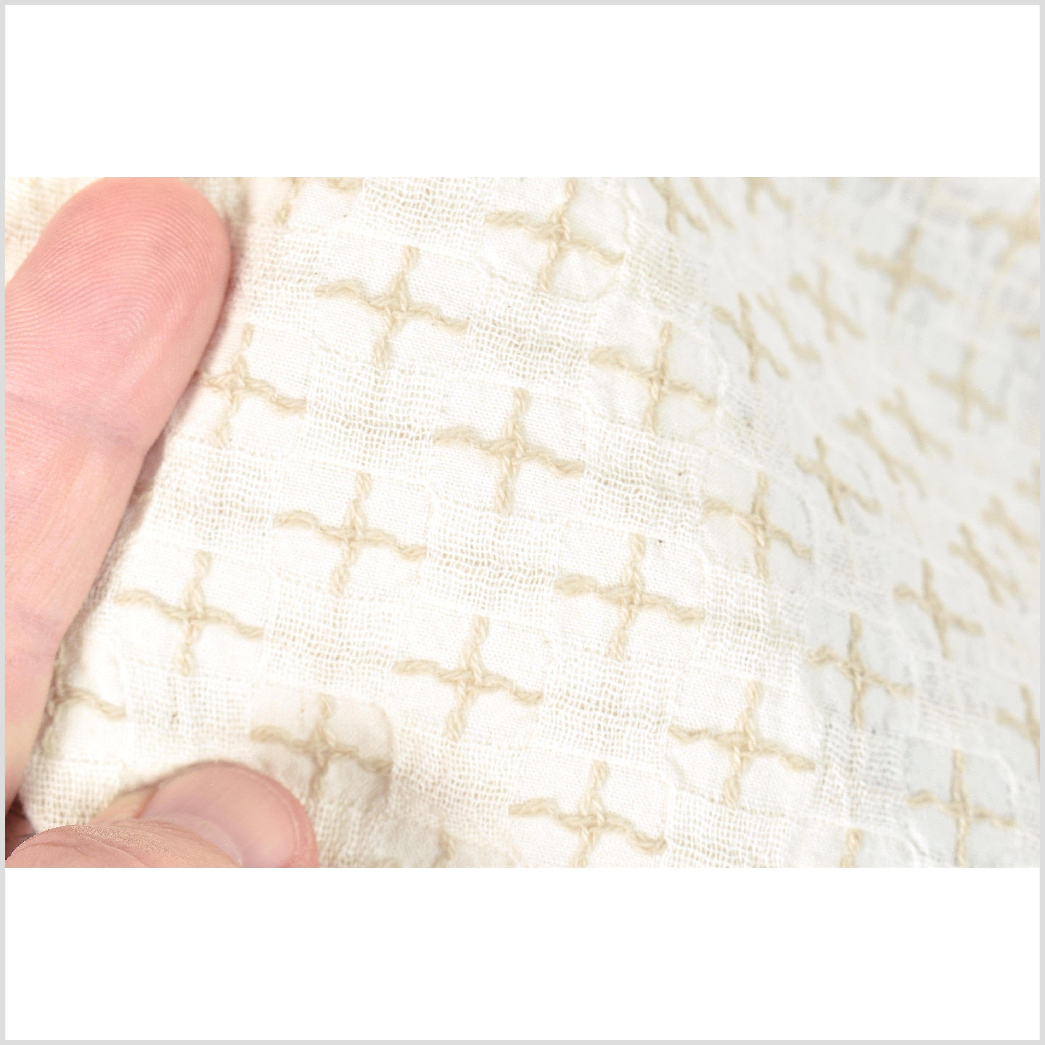 Quilted cotton and linen fabric, cream with beige cross and square qui ...