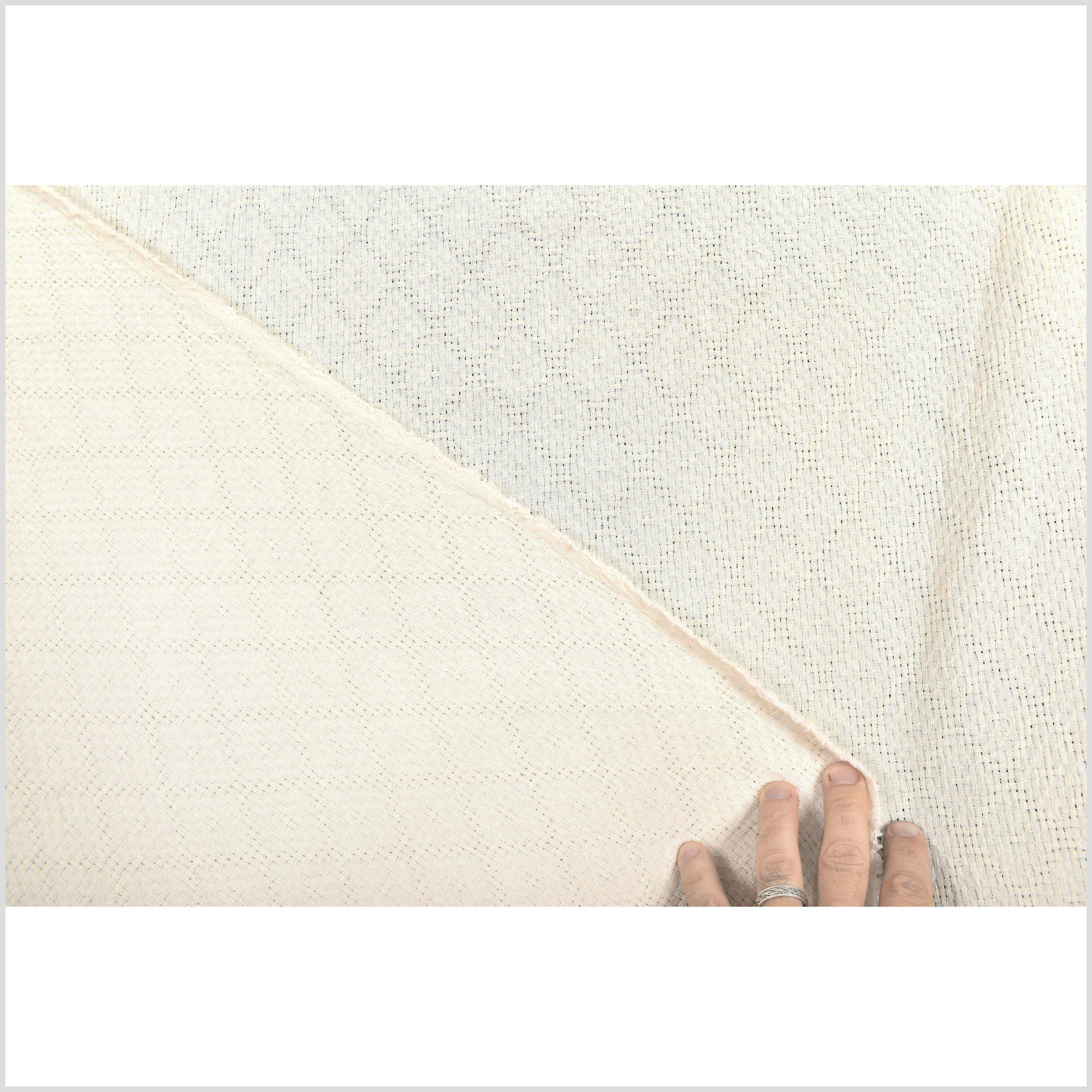 Neutral off white woven cotton fabric, mesh like, diamond and cross pa ...